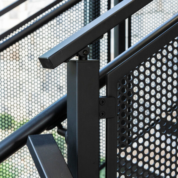 Floating Stairs with Porcelain Treads and Perforated Railing Panels ...