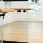 Sleek Commercial Glass Railing with Continuous Handrail | Viewrail