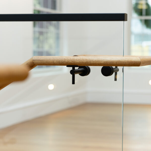 Sleek Commercial Glass Railing with Continuous Handrail | Viewrail