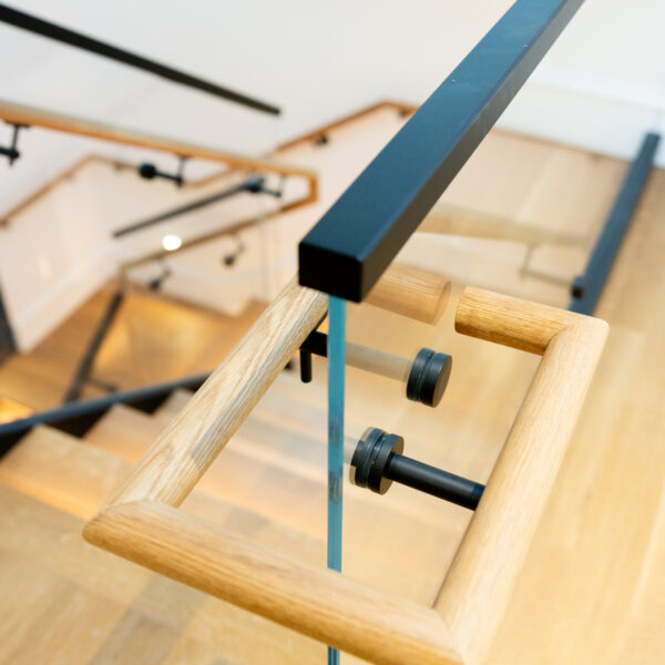 Sleek Commercial Glass Railing with Continuous Handrail | Viewrail