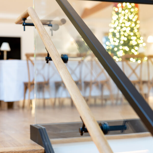 Sleek Commercial Glass Railing with Continuous Handrail | Viewrail