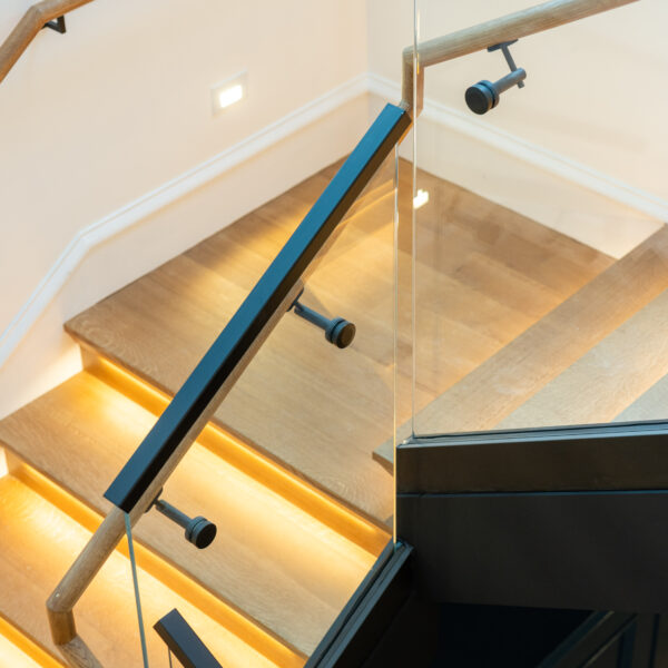 Sleek Commercial Glass Railing with Continuous Handrail | Viewrail