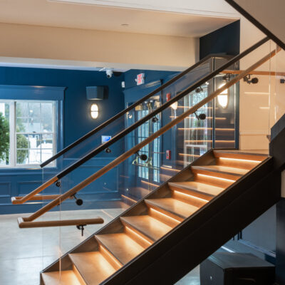 Sleek Commercial Glass Railing with Continuous Handrail | Viewrail