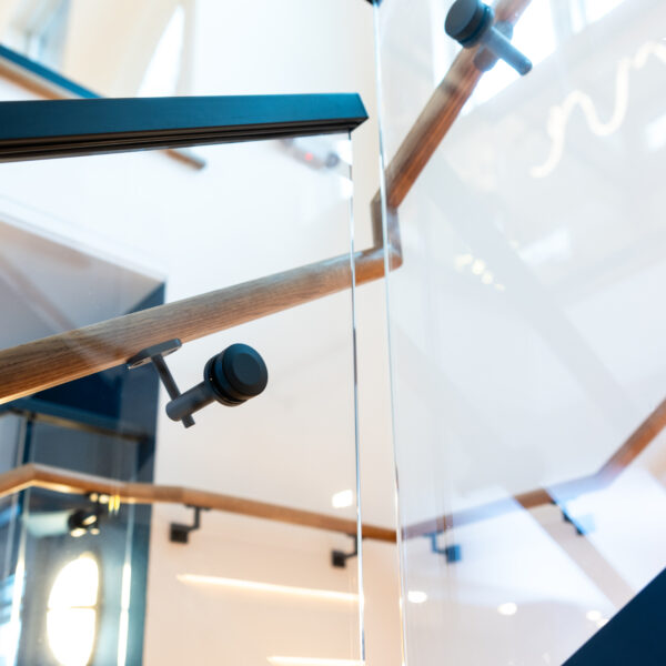 Sleek Commercial Glass Railing with Continuous Handrail | Viewrail