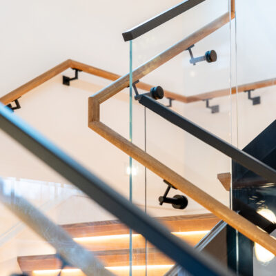 Sleek Commercial Glass Railing with Continuous Handrail | Viewrail